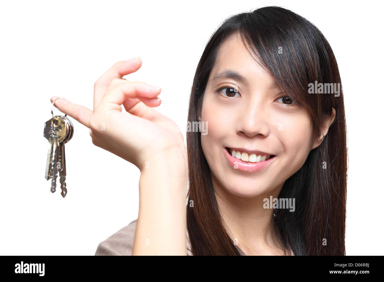 woman with keys over white Stock Photo - Alamy