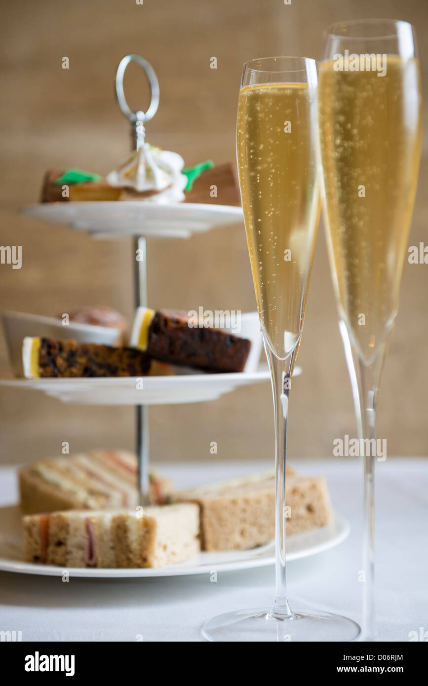 Champagne and afternoon tea and cakes Stock Photo - Alamy