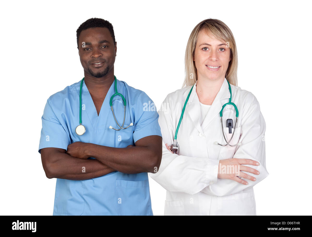 Couple of young doctors a over white background Stock Photo - Alamy