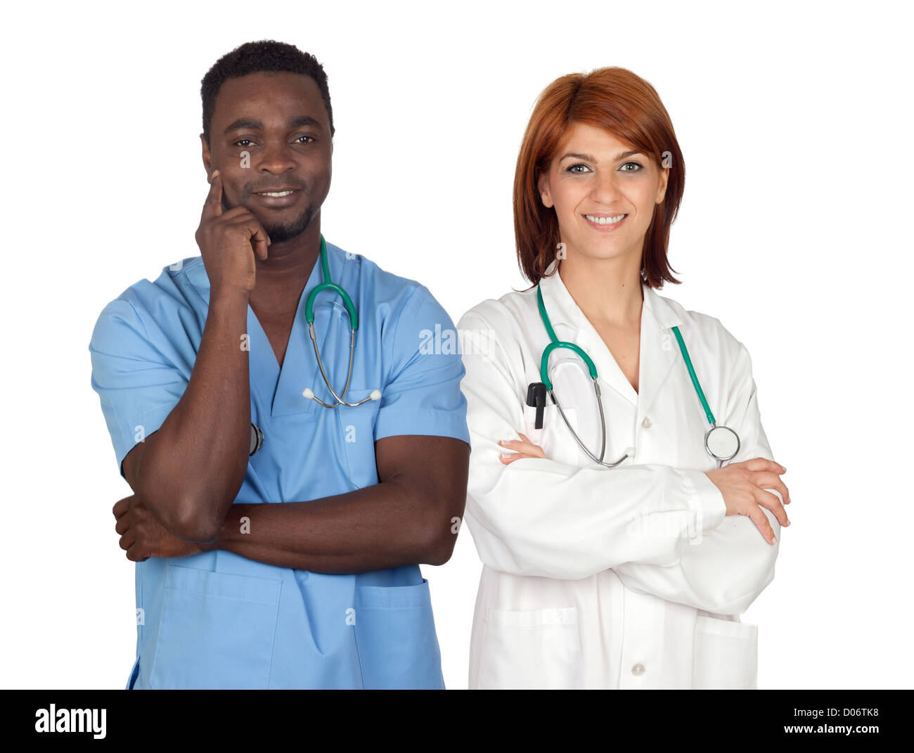 Couple of young doctors a over white background Stock Photo - Alamy