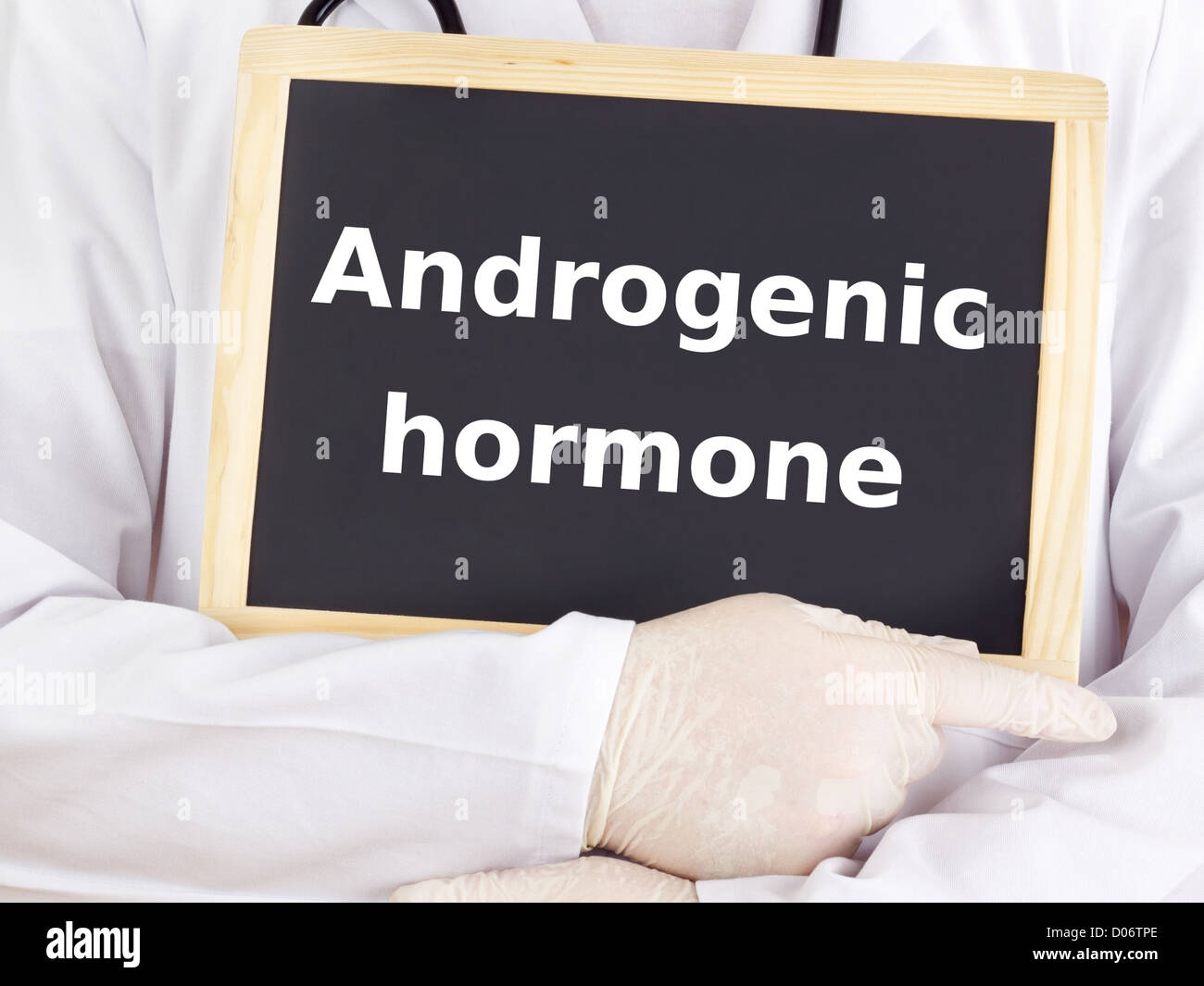 Doctor shows information: androgenic hormone Stock Photo - Alamy