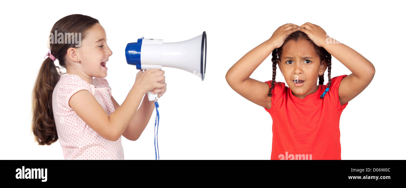Little girl shouting through megaphone and a african baby isolated over ...