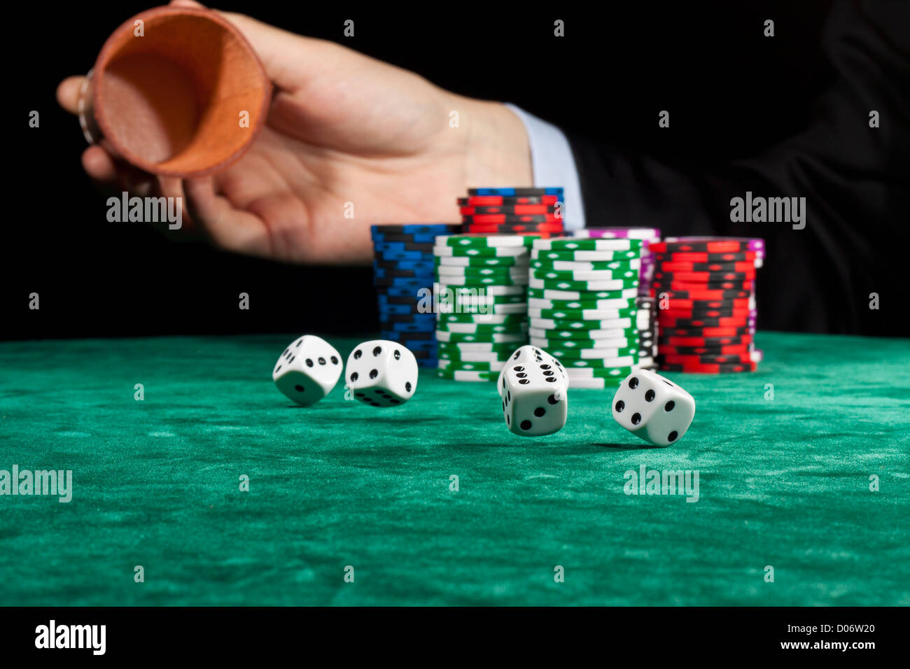 Man rolling dice hi-res stock photography and images - Alamy