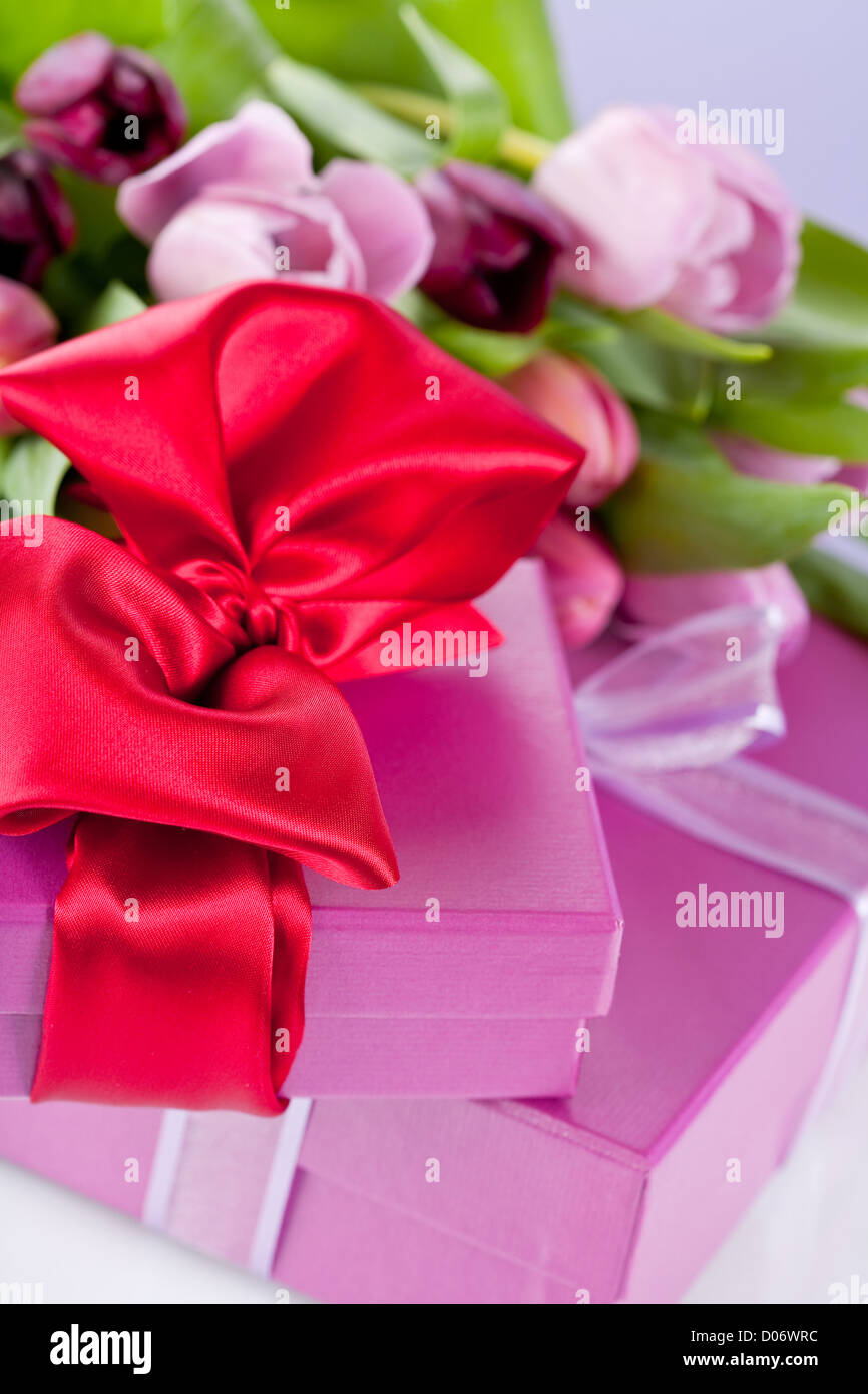 Pink tulips and gift boxes Stock Photo - Alamy