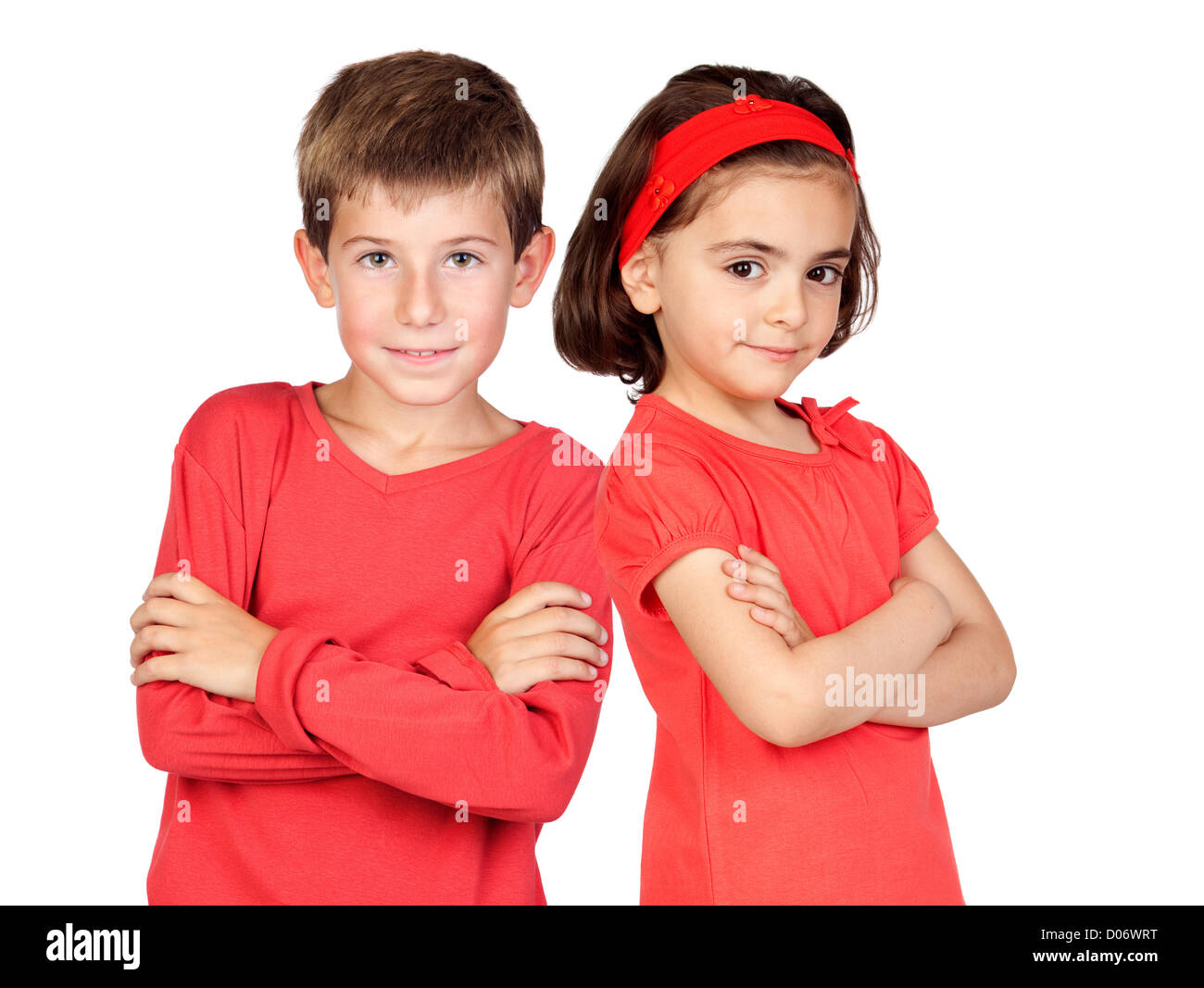 Two children in red isolated on white background Stock Photo - Alamy