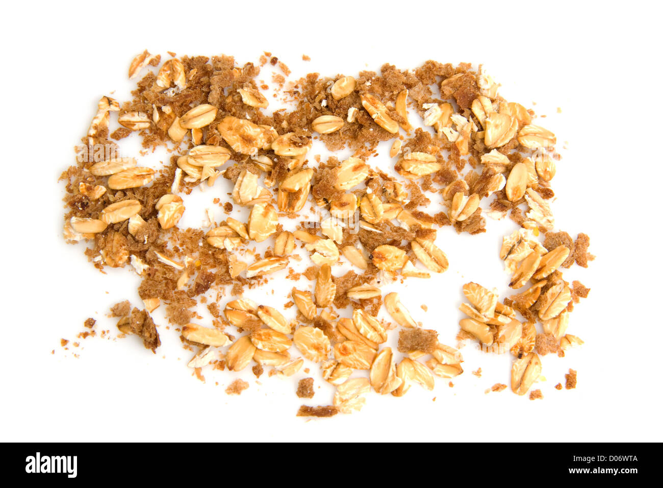 Bread crumbs and flakes in closeup over white background Stock Photo ...