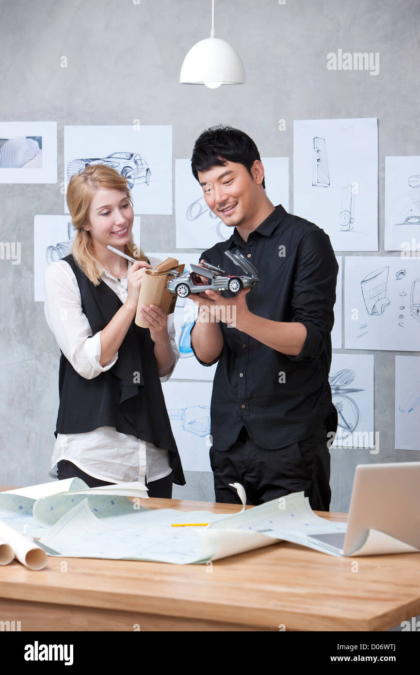 Car designer and assistant at work Stock Photo - Alamy