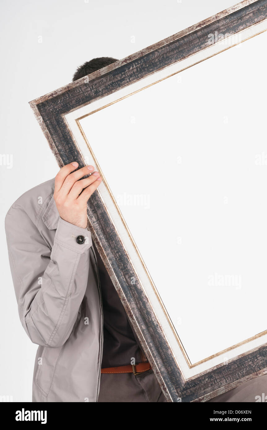Man holding empty frame Stock Photo - Alamy