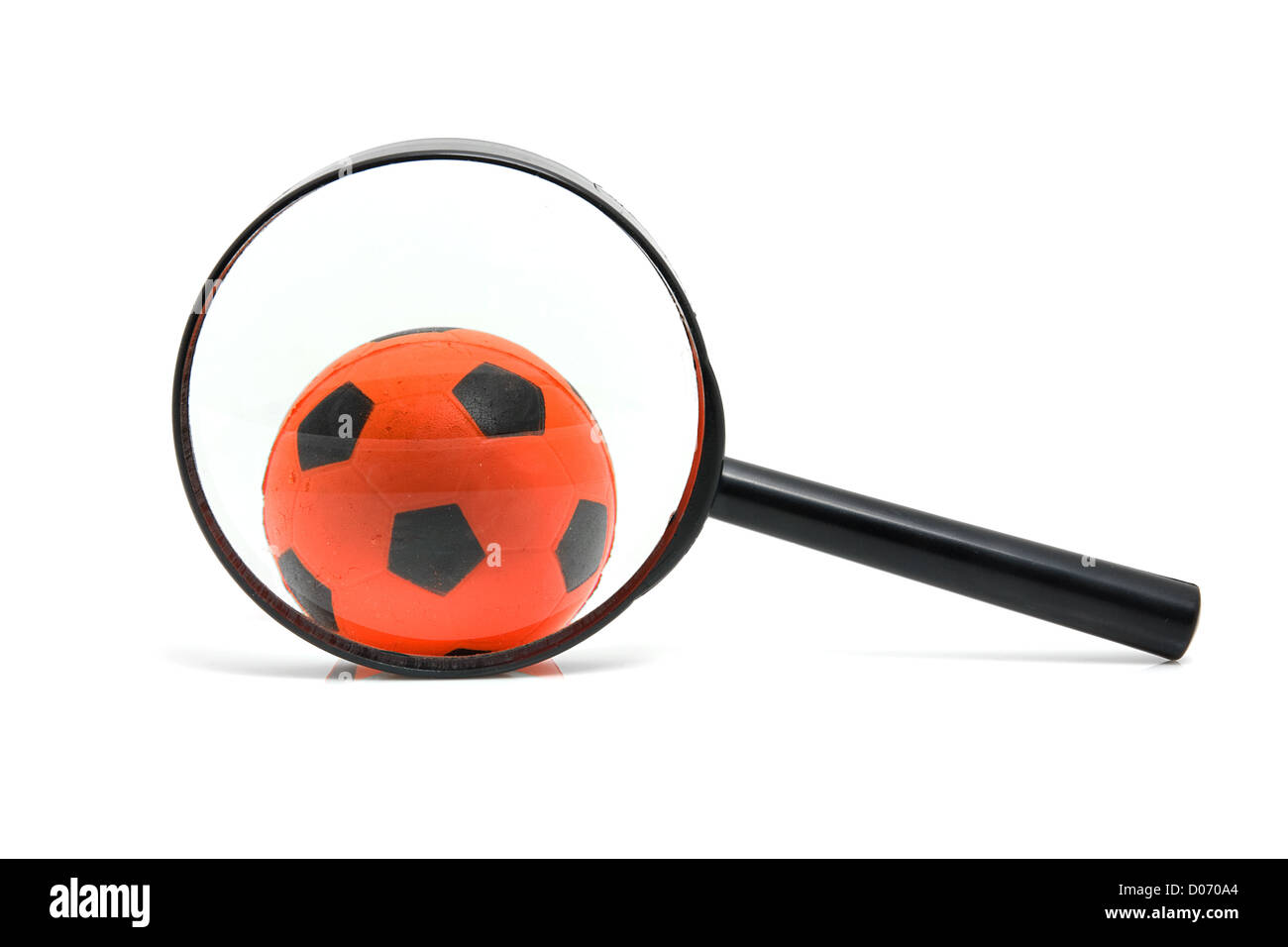 black magnifying glass with orange soccer ball isolated on white ...