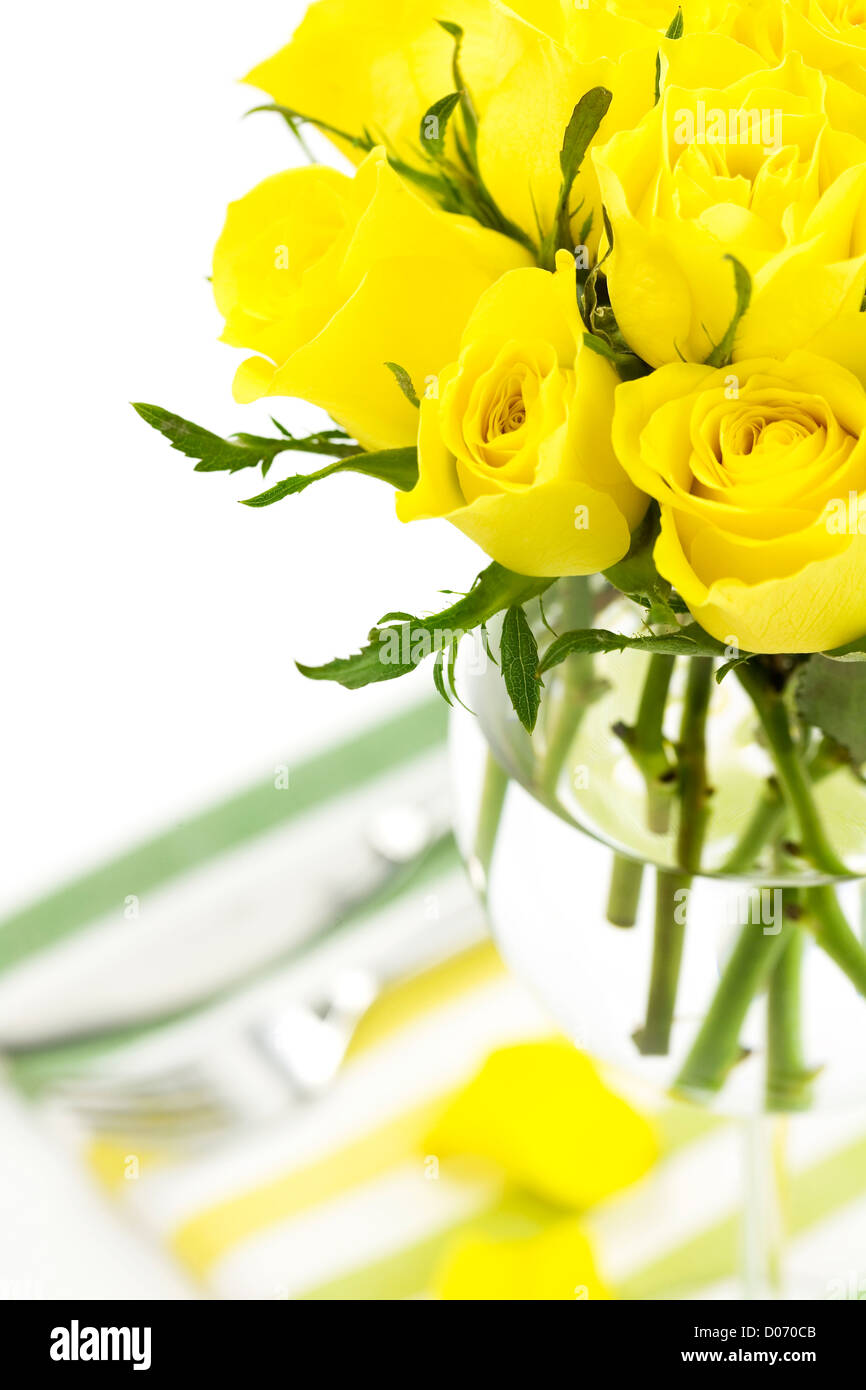 Place setting with yellow roses Stock Photo - Alamy