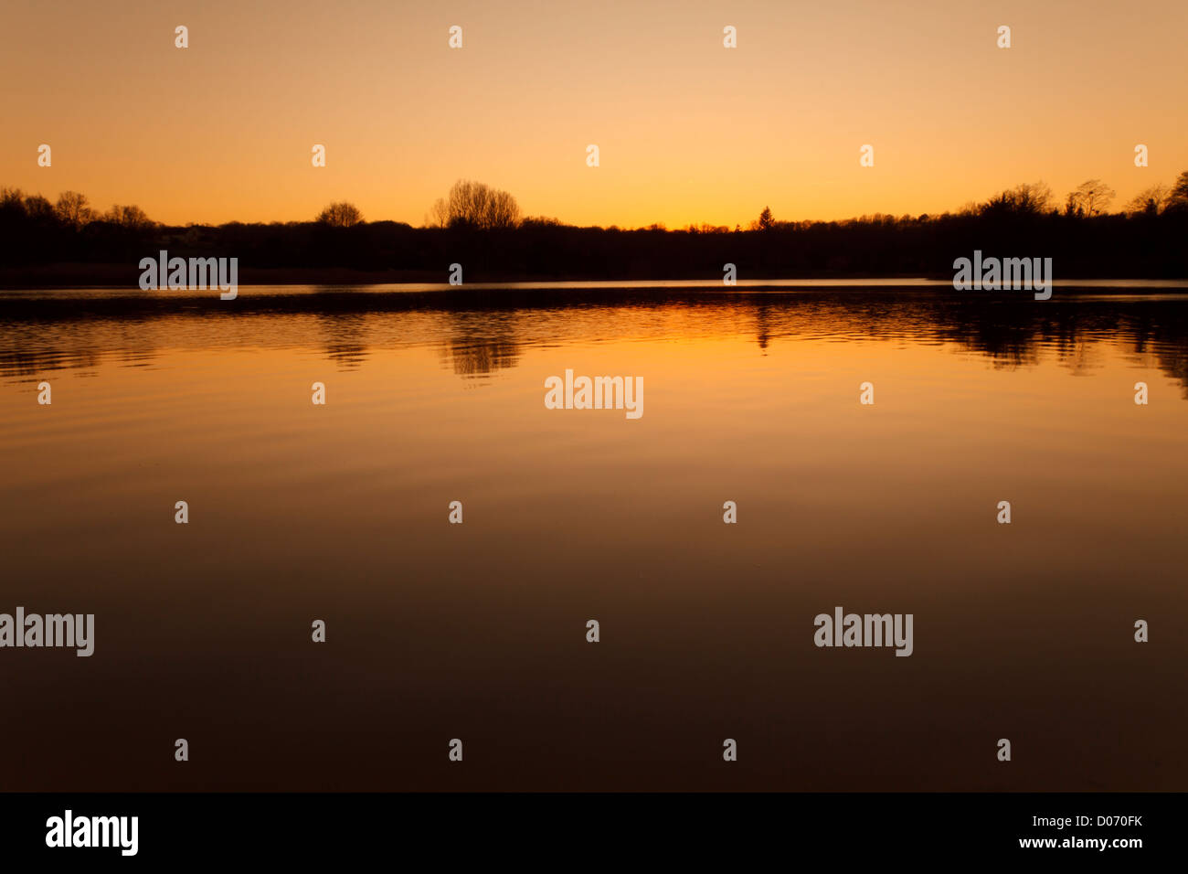 Sunset over lake in countryside, France, Europe Stock Photo - Alamy