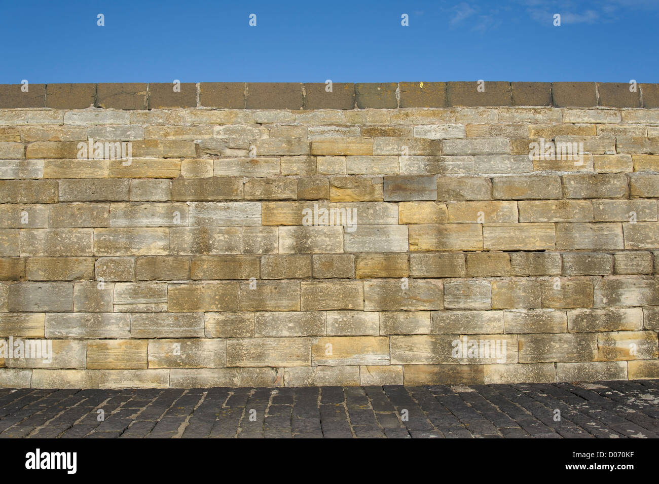 A well built sandstone block wall, at Dunbar harbour, East Lothian ...