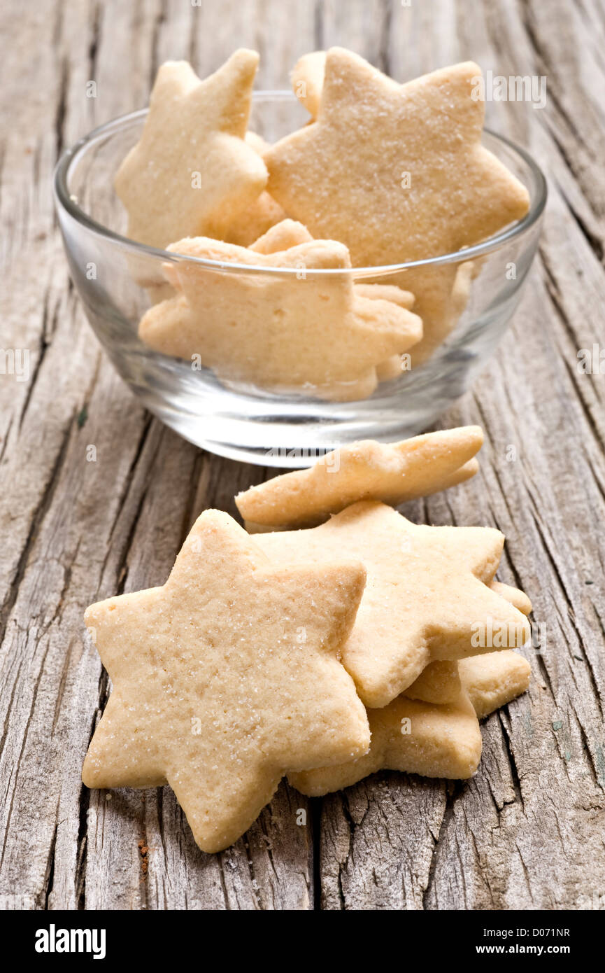 Sugar coated shortbread cookies in star shapes stacked up Stock Photo ...