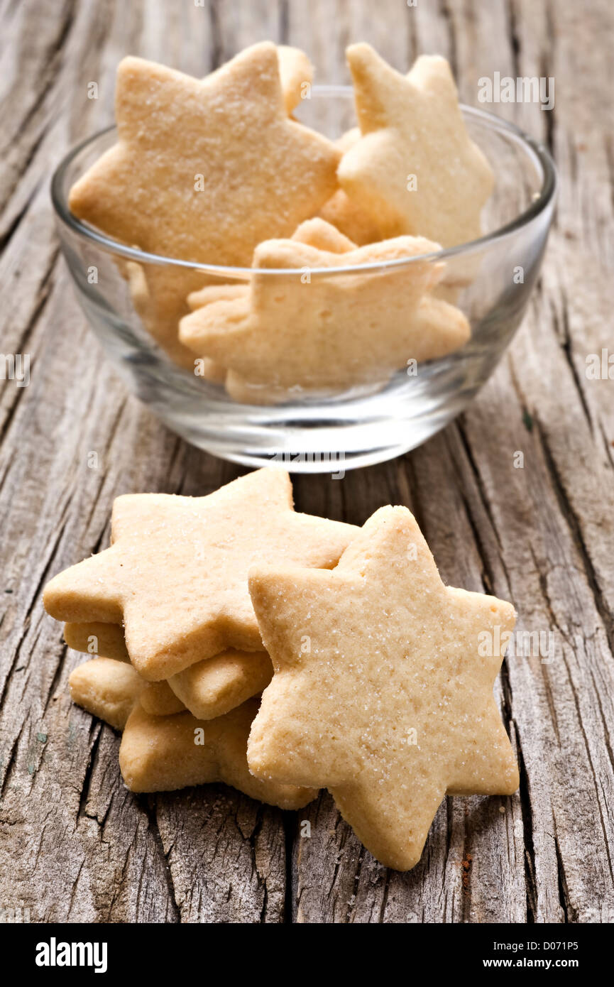 Sugar coated shortbread cookies in star shapes stacked up Stock Photo ...