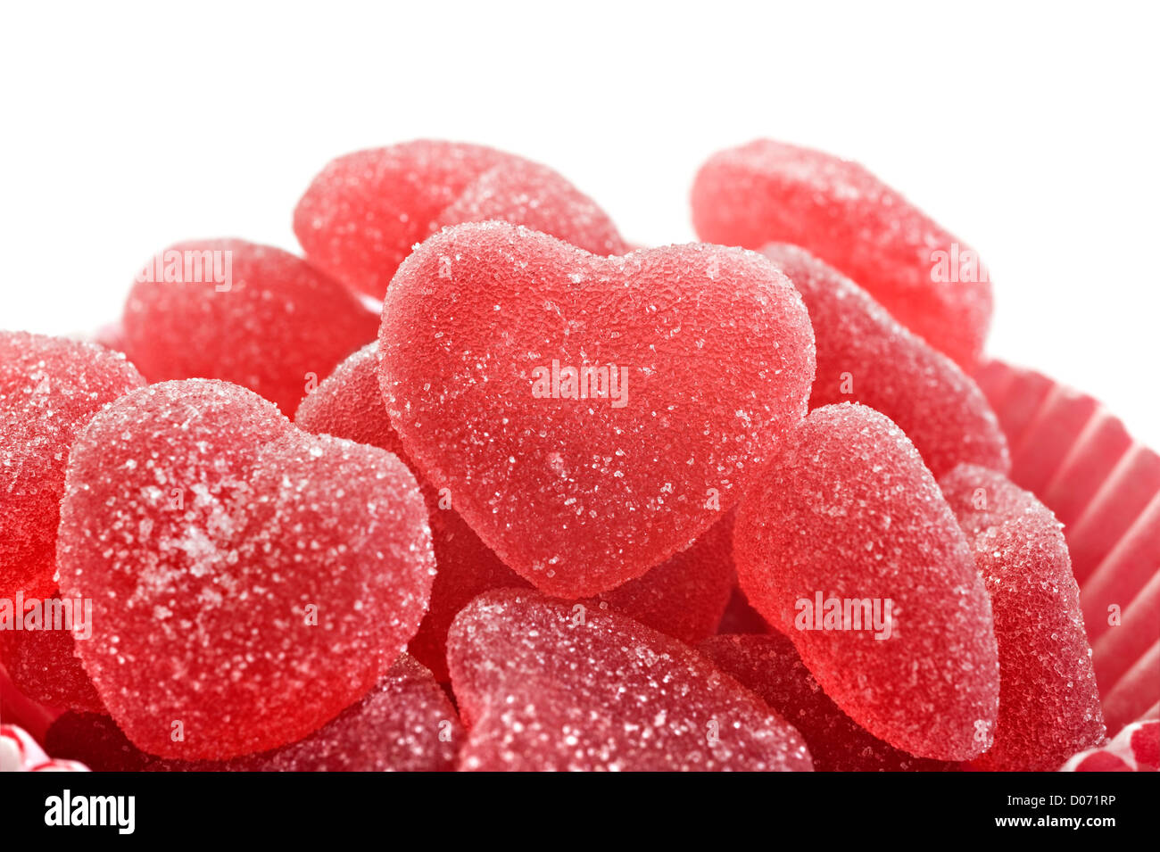 Red heart shaped jelly sweets on a white background Stock Photo - Alamy