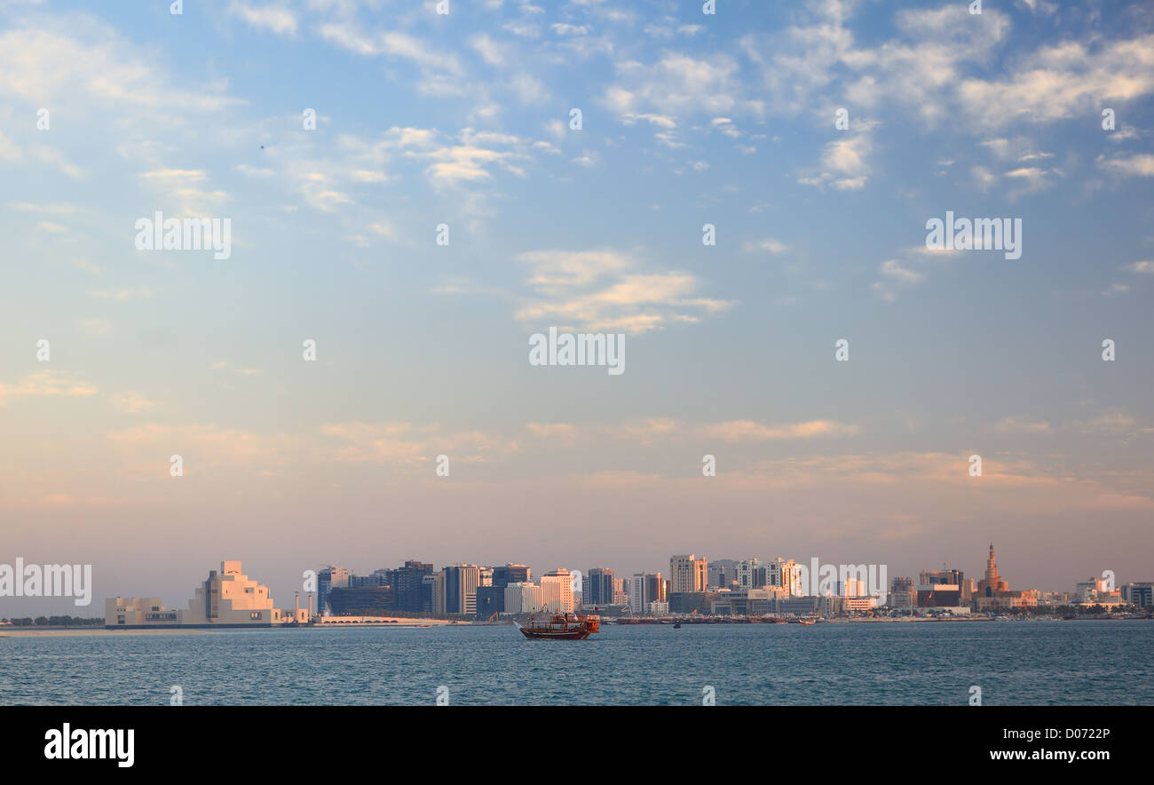 A view across Doha Bay, Qatar, in autumn with clouds capturing the ...