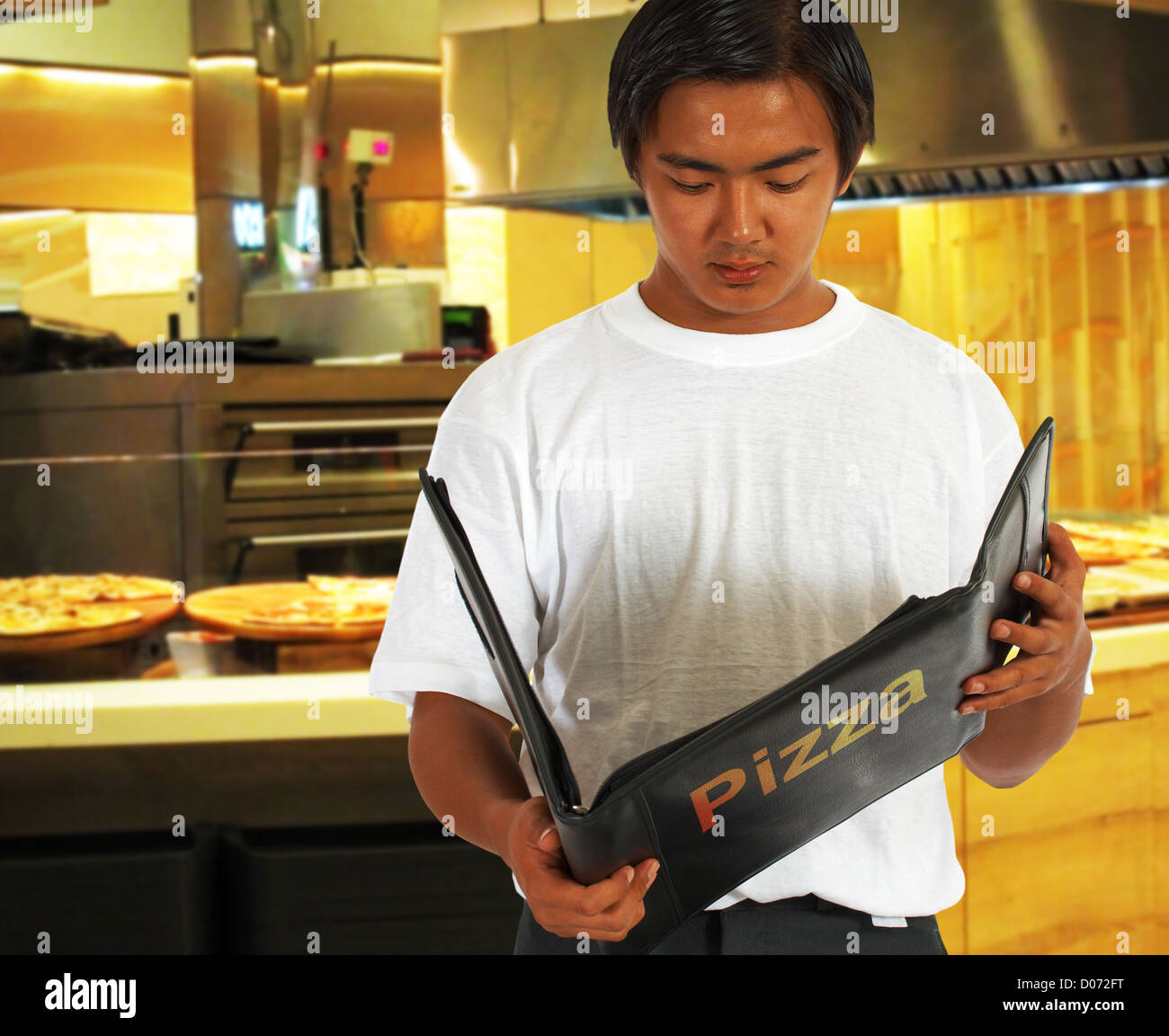 Selecting pizza hi-res stock photography and images - Alamy