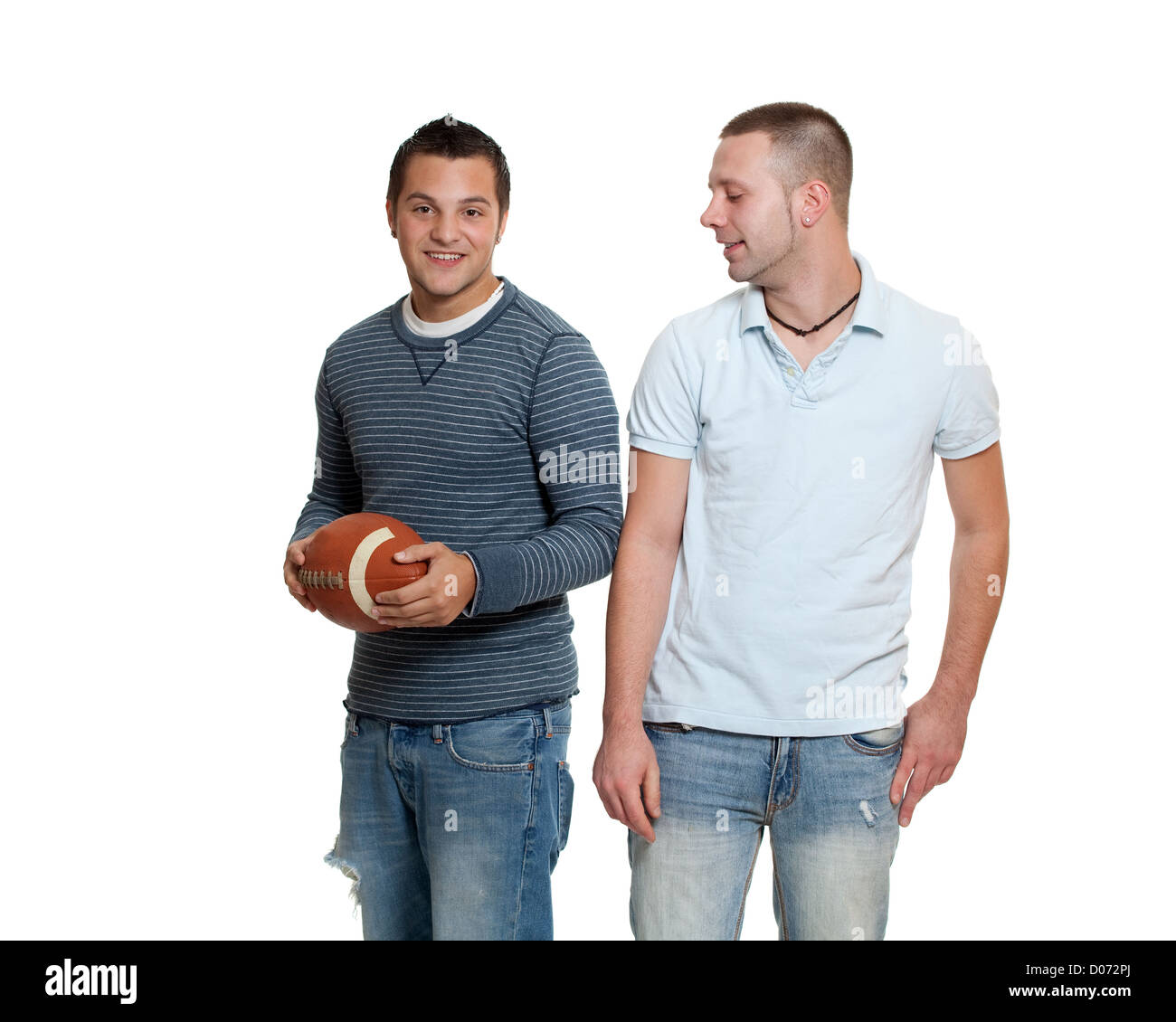Two men with football Stock Photo - Alamy