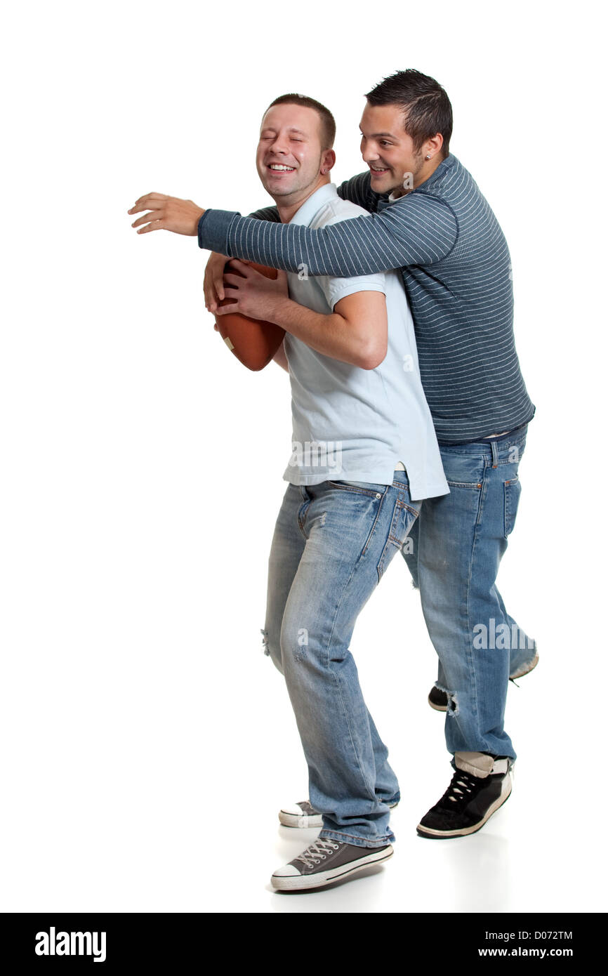 Two men with football Stock Photo - Alamy