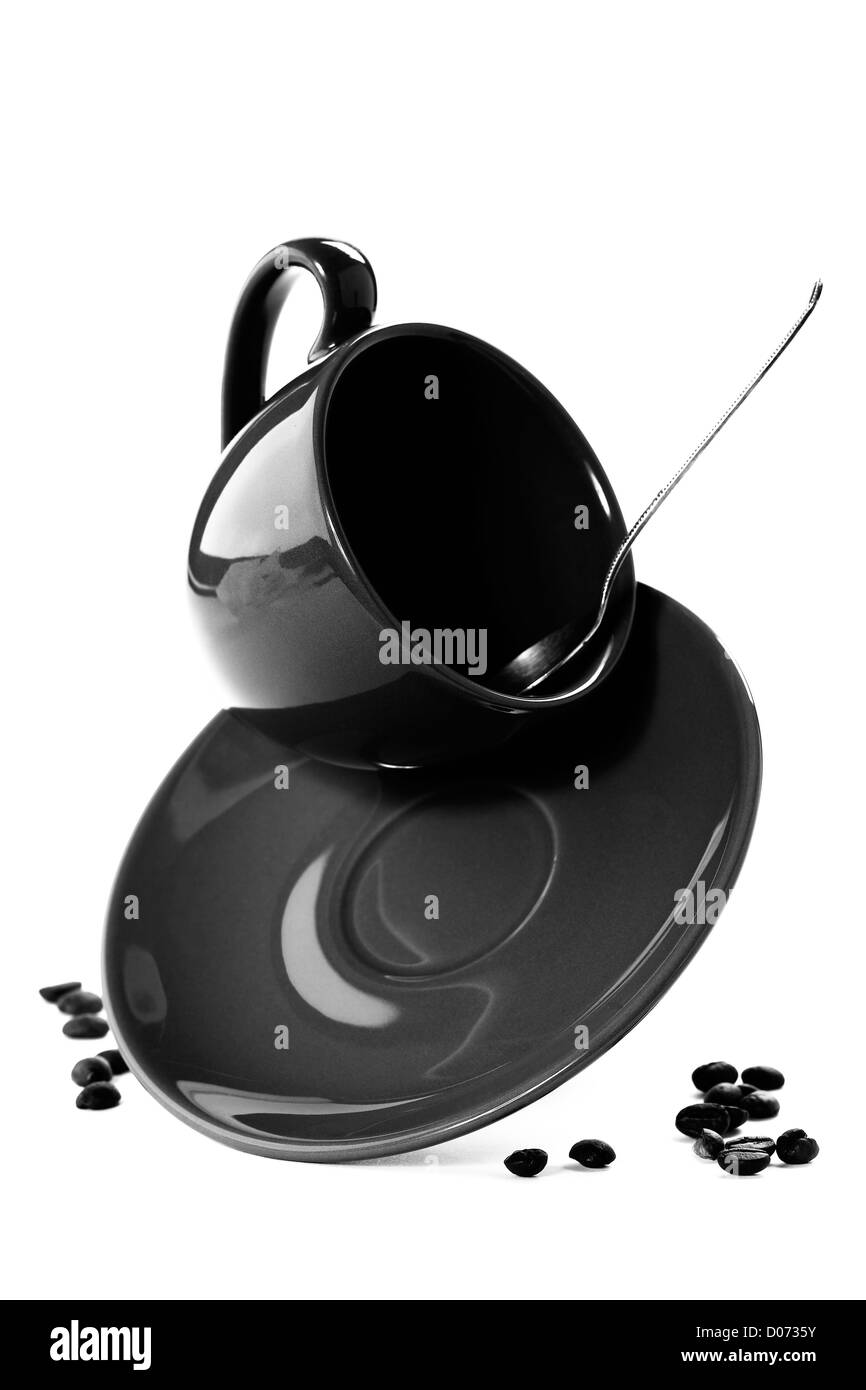 coffee cup is falling down on a white background Stock Photo - Alamy