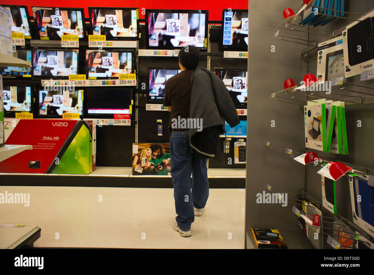 Shopper browses flat-screen televisions in a Target store in New York ...