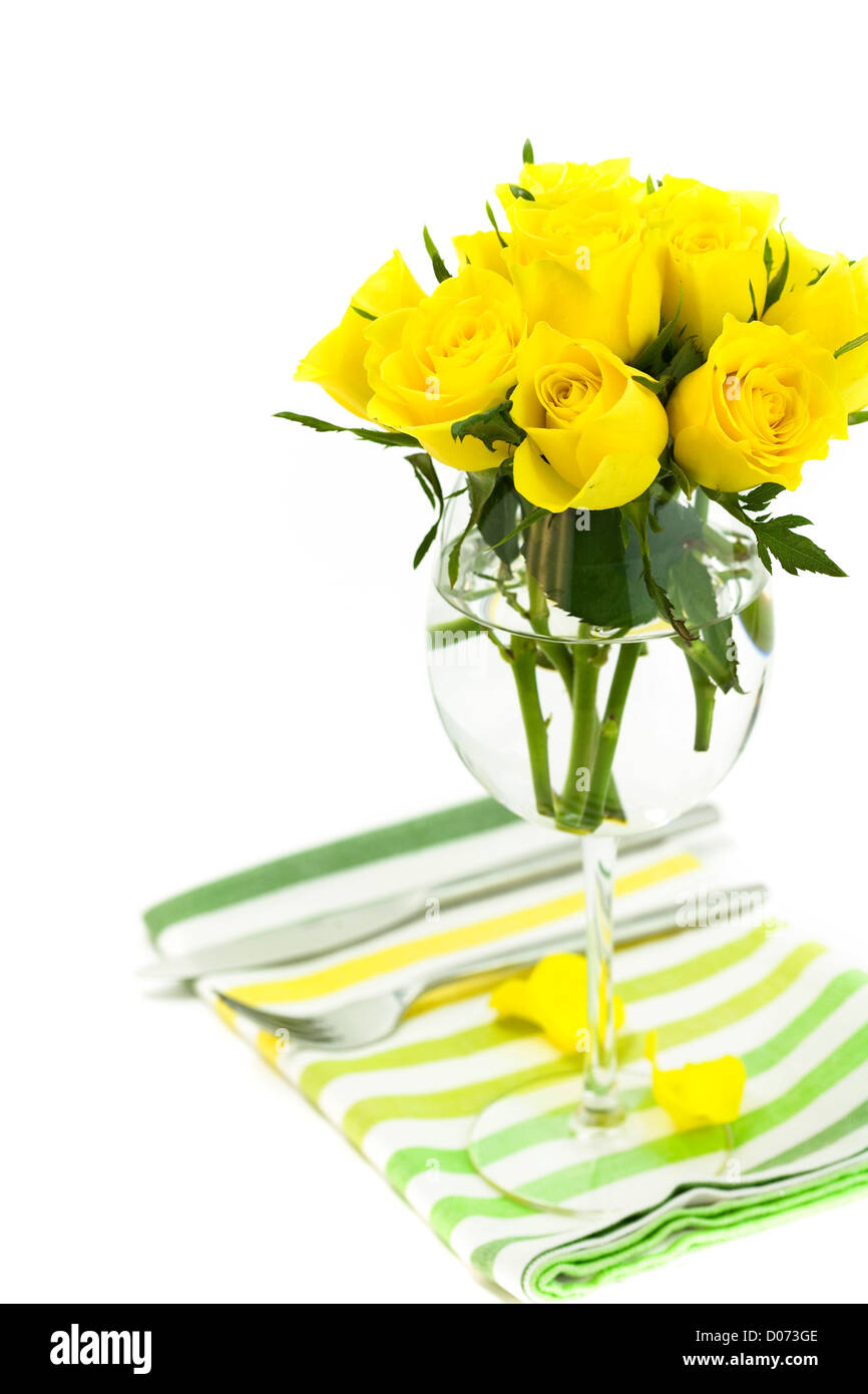 Place setting with yellow roses Stock Photo - Alamy