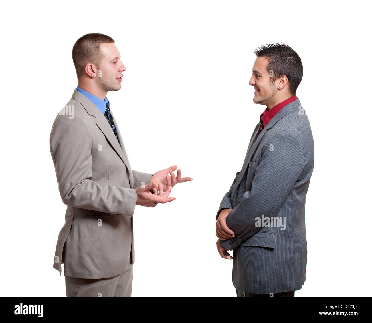 Two young white people talking Cut Out Stock Images & Pictures - Alamy