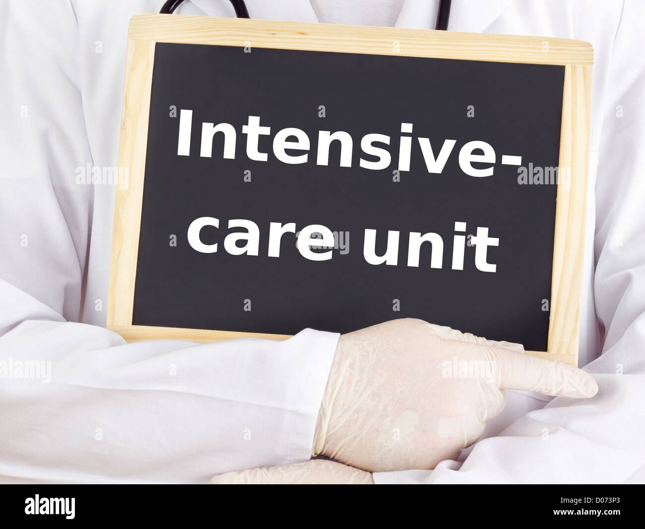 Doctor shows information: intensive-care unit Stock Photo - Alamy