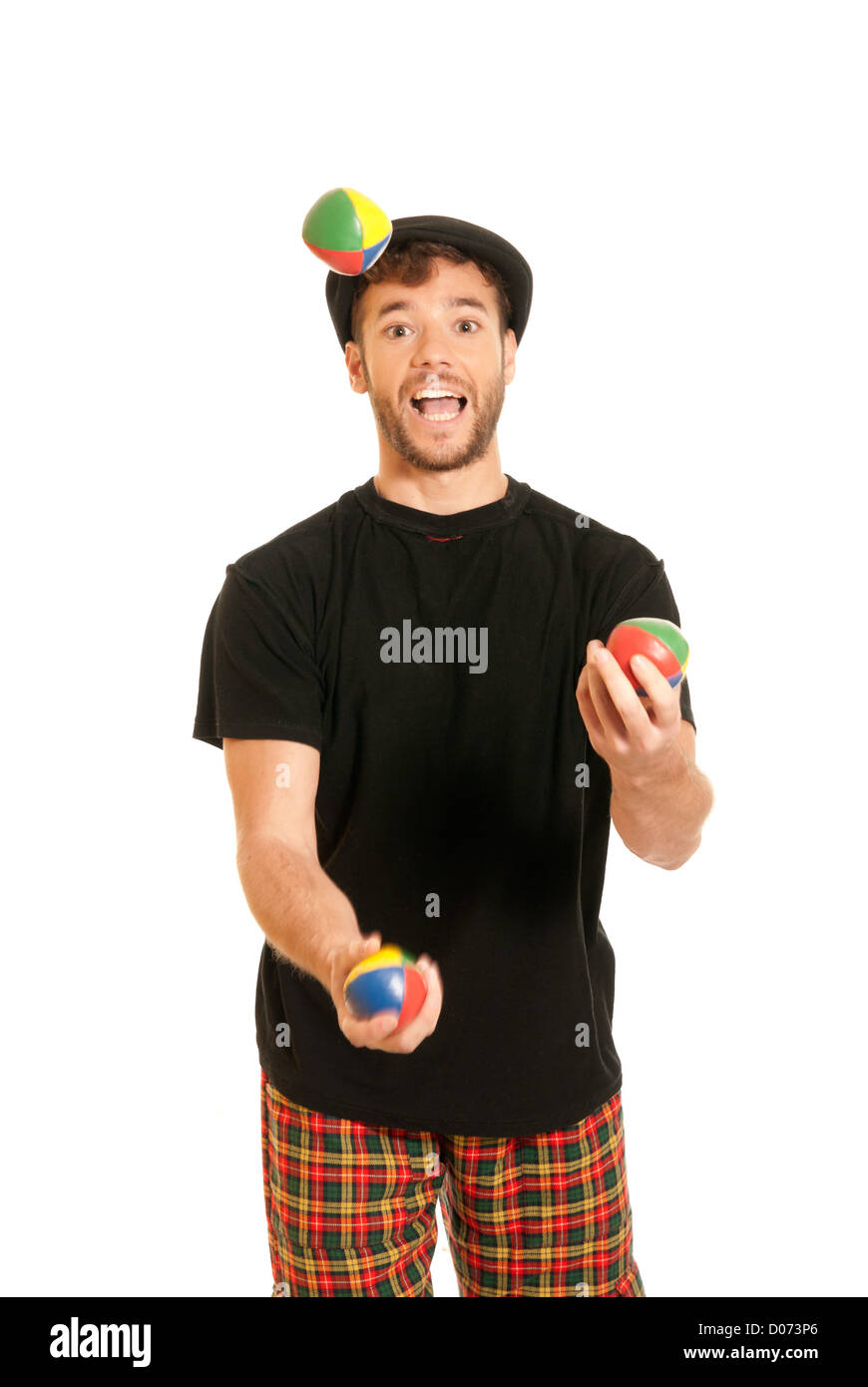 Young man juggling isolated on white background Stock Photo - Alamy