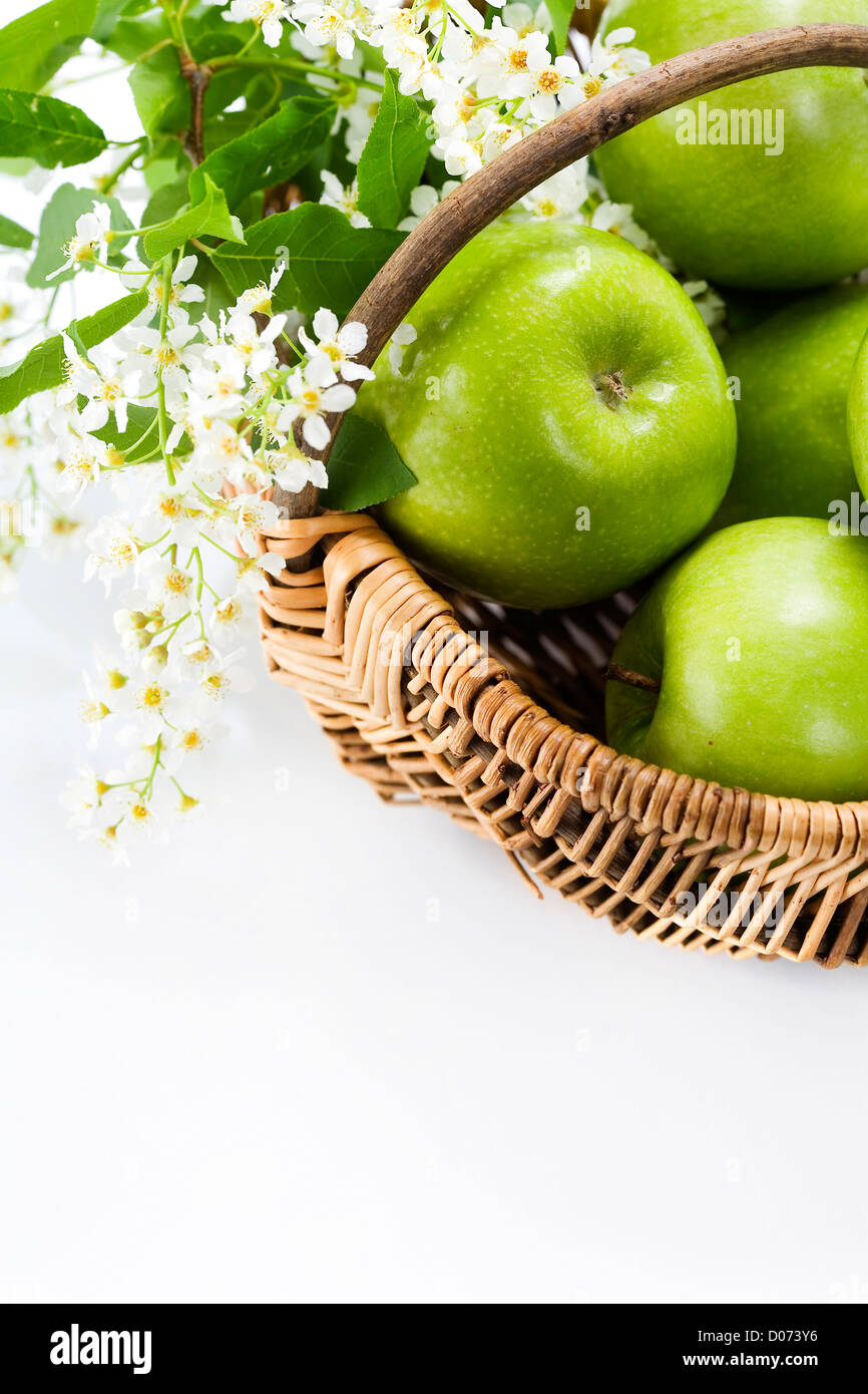 Green apple with flowers Stock Photo - Alamy