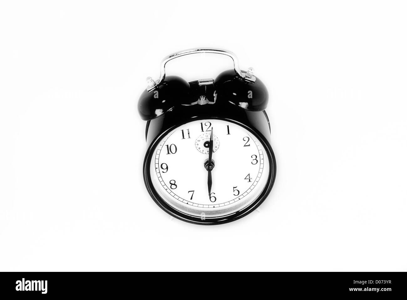 an alarm clock on white background Stock Photo - Alamy