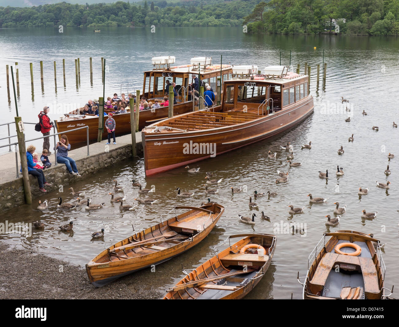 The traditional old wooden pleasure boats at the moorings on ...