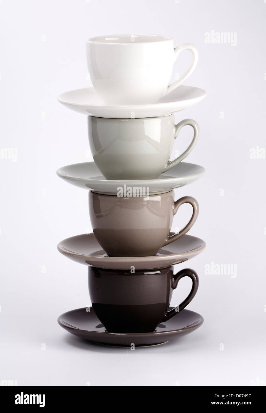 Color cups on a white background Stock Photo - Alamy