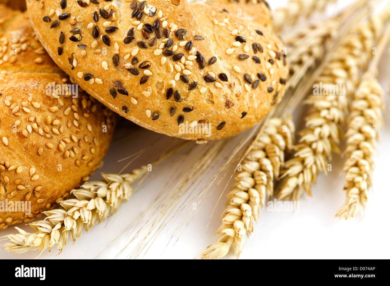 Wheat and bread over white background Stock Photo - Alamy