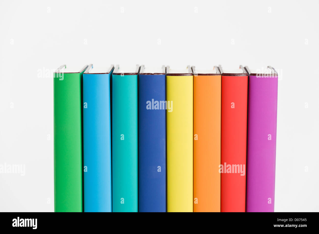 Colorful books and white background Stock Photo - Alamy