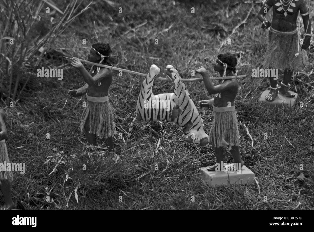 Miniature of Tribal Hunting party killing tiger Stock Photo - Alamy
