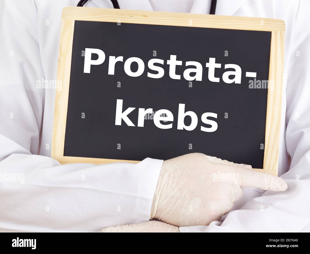 Doctor shows information: prostate cancer Stock Photo - Alamy