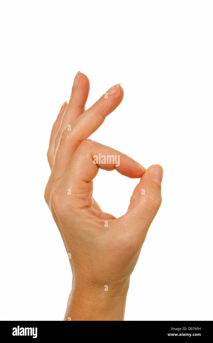 Woman's hand making OK sign over white background Stock Photo - Alamy