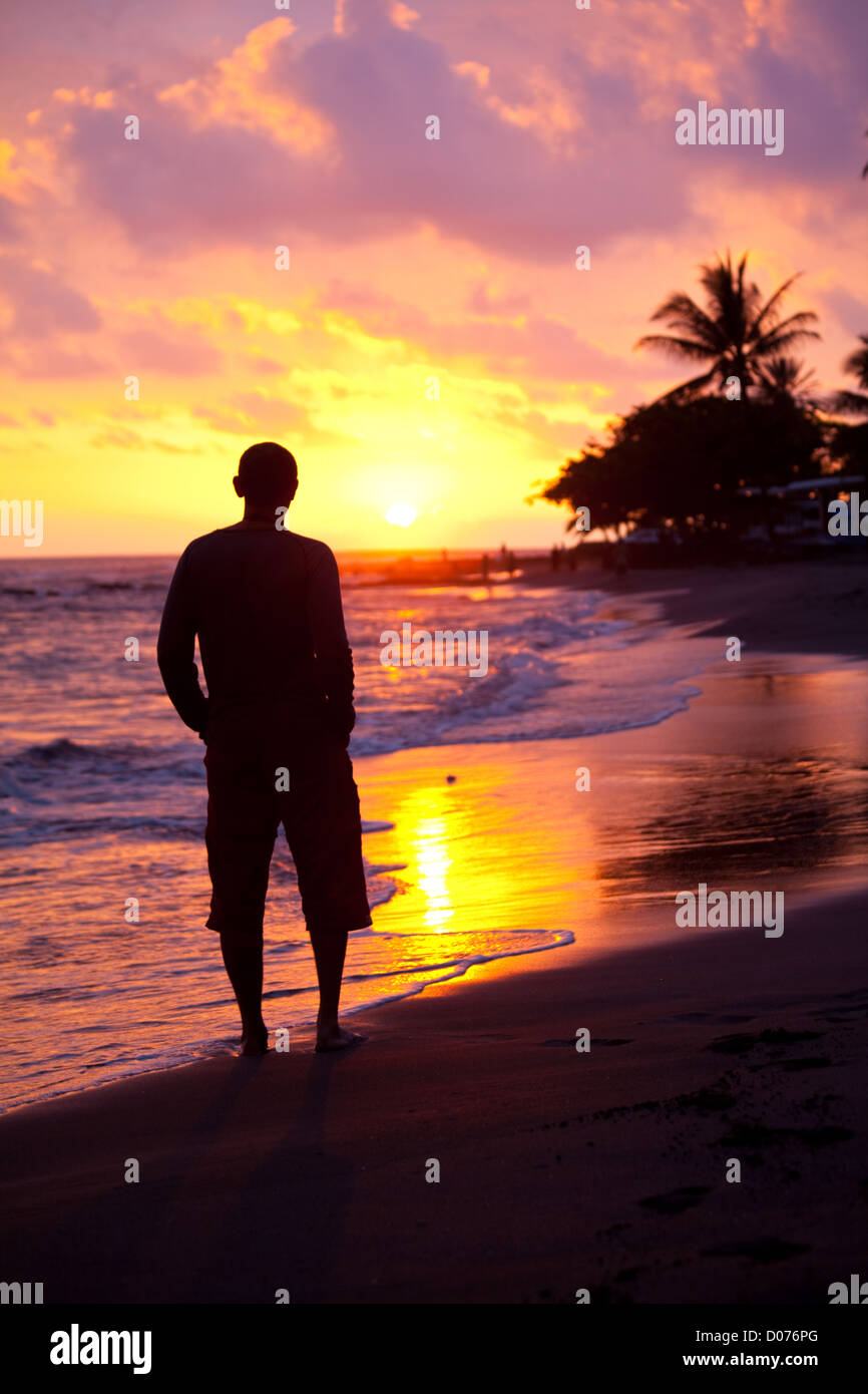 Man on beach Stock Photo - Alamy