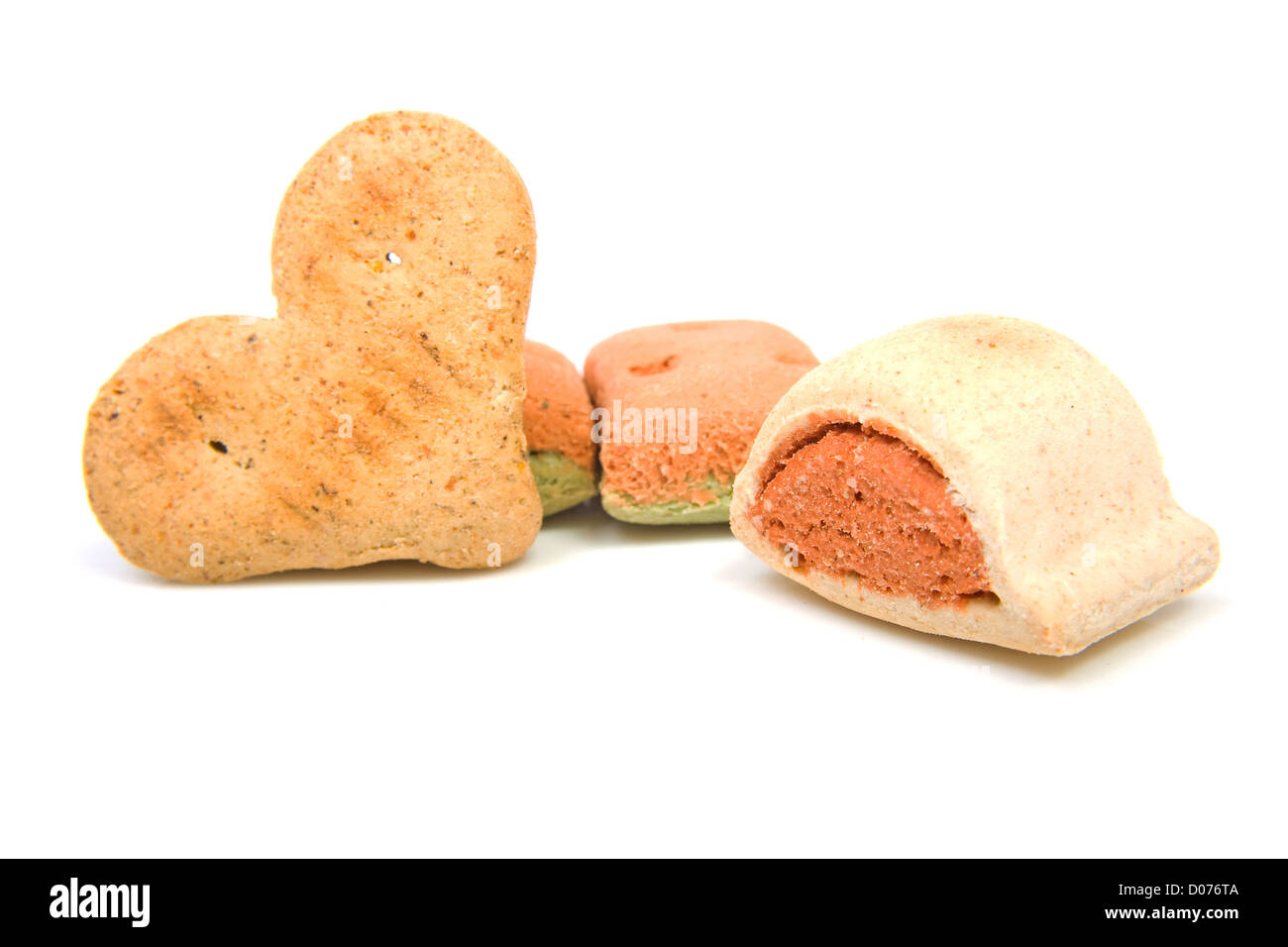 Funny shapes dog cookies over white background Stock Photo - Alamy