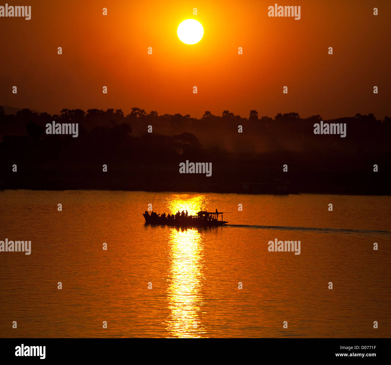 Sunset scene in Myanmar Stock Photo - Alamy