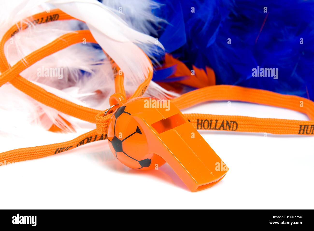 Orange flute in shape of soccer ball with accessories for Dutch game ...