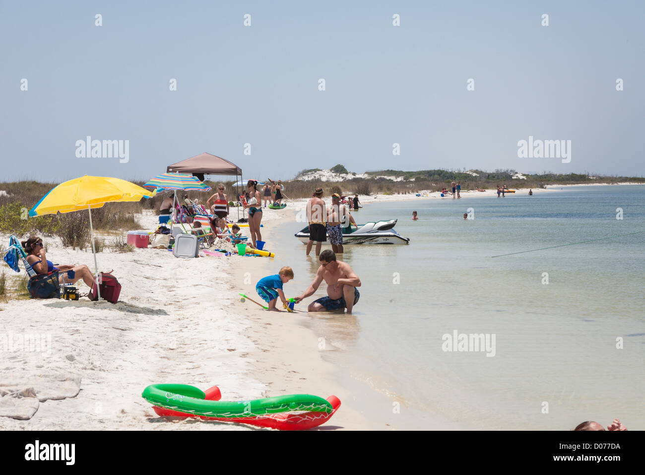 Surf gulf of mexico shore shoreline sunbathers families hi-res stock ...