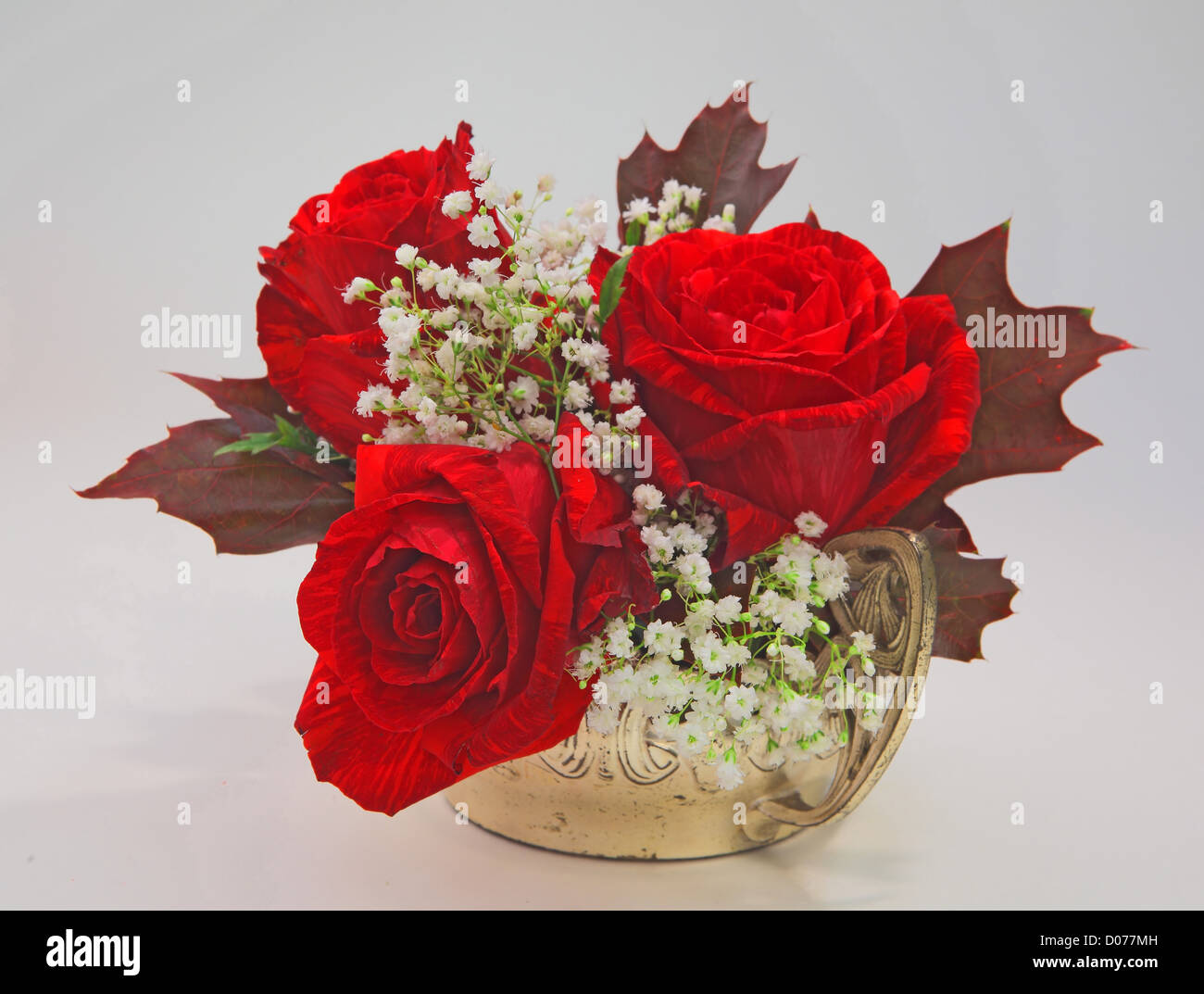 bunch of the flowers arranged in the bowel isolated in gray Stock Photo ...