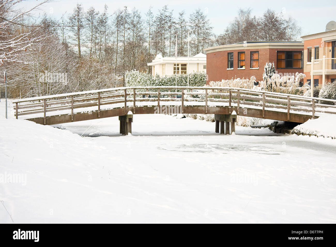 houses and Bridge with snow, it is winter in Holland Stock Photo - Alamy