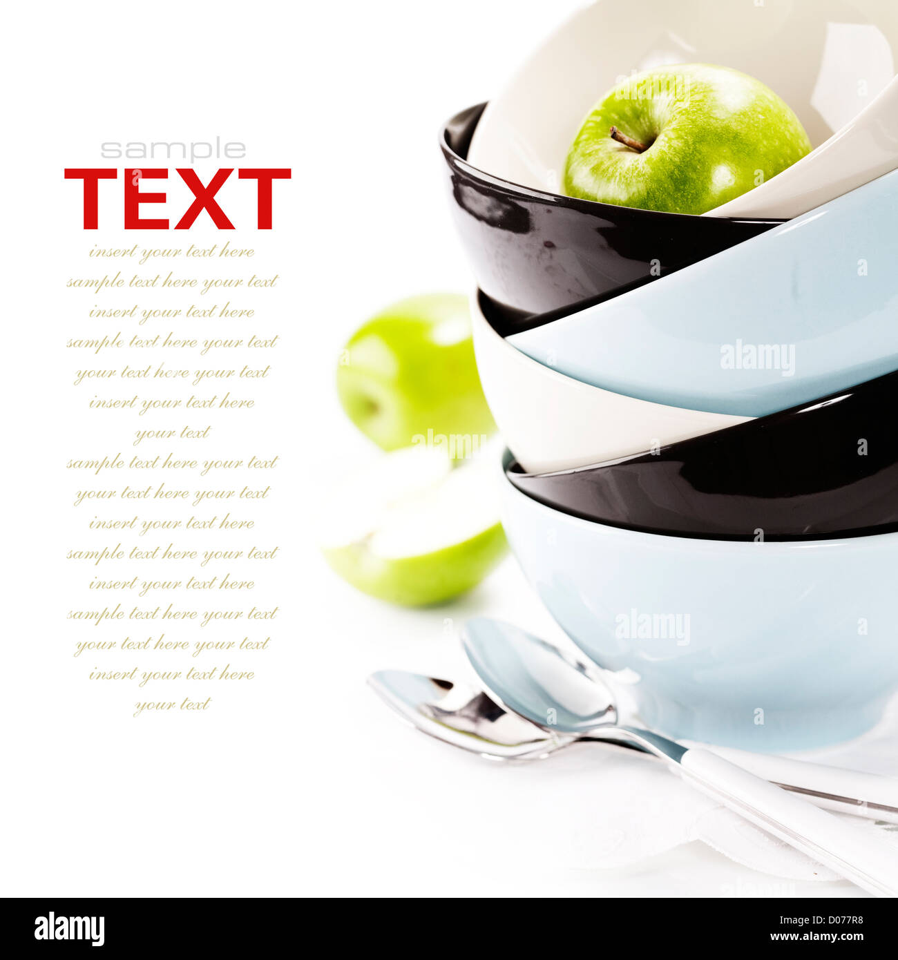 Stack of bowls and green apples Stock Photo - Alamy