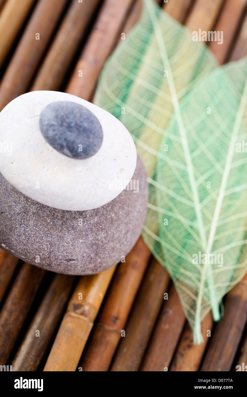 stack of balanced zen stones and skeleton leaf Stock Photo - Alamy