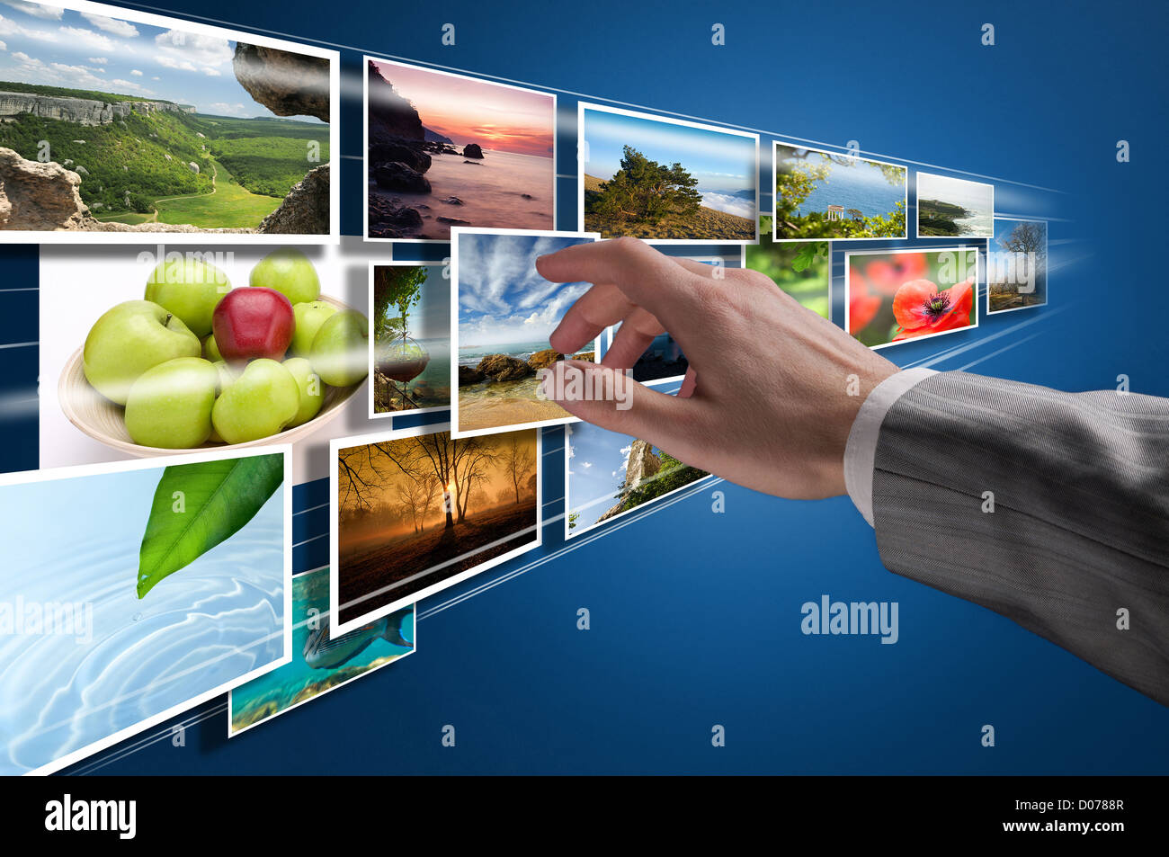 Choosing pictures on touchscreen Stock Photo - Alamy