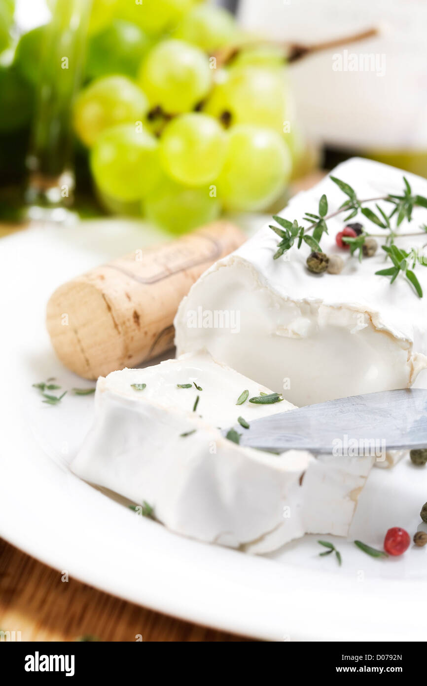 white soft goat cheese and grape Stock Photo - Alamy
