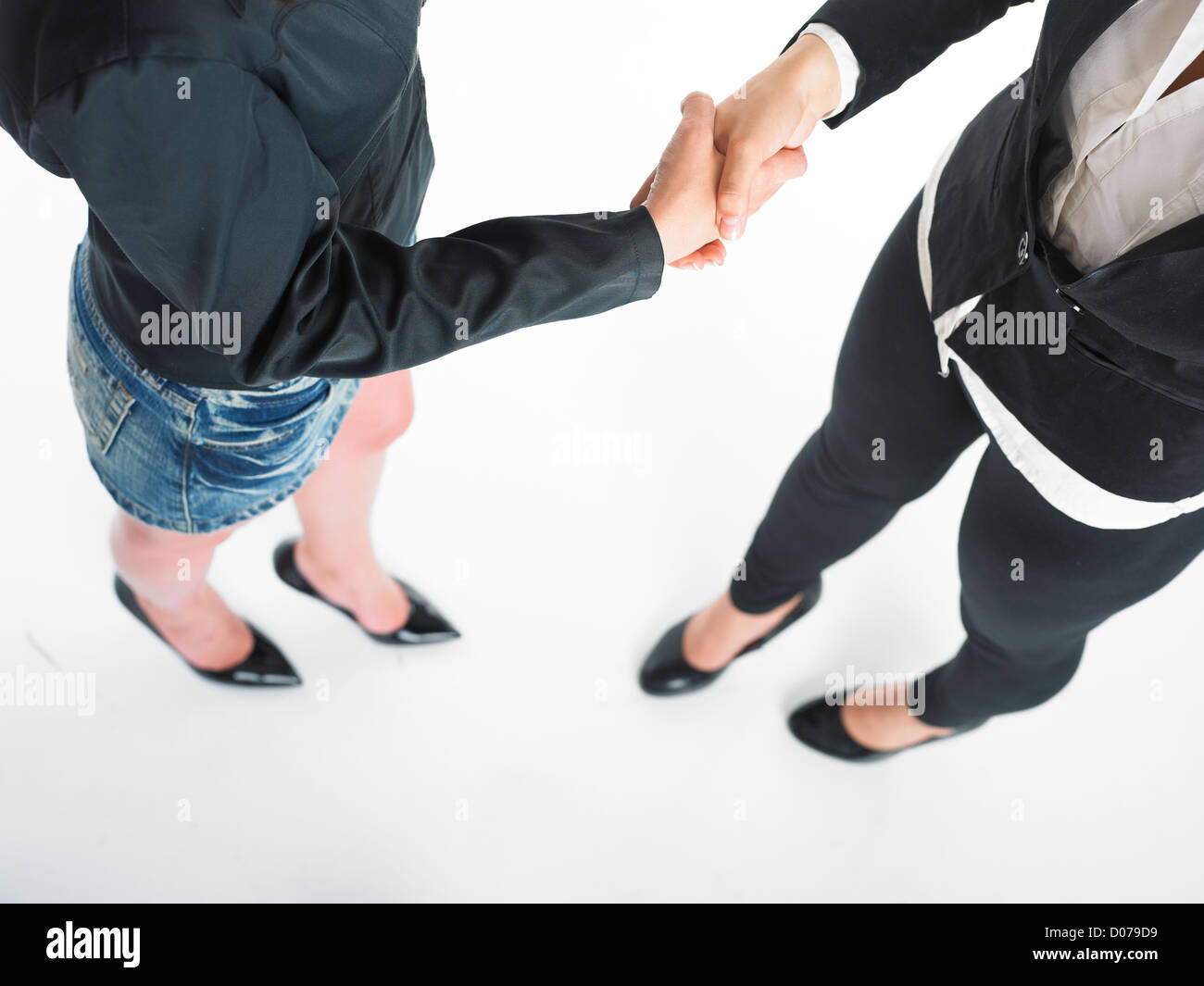 Two business woman Handshaking Handshake Stock Photo - Alamy